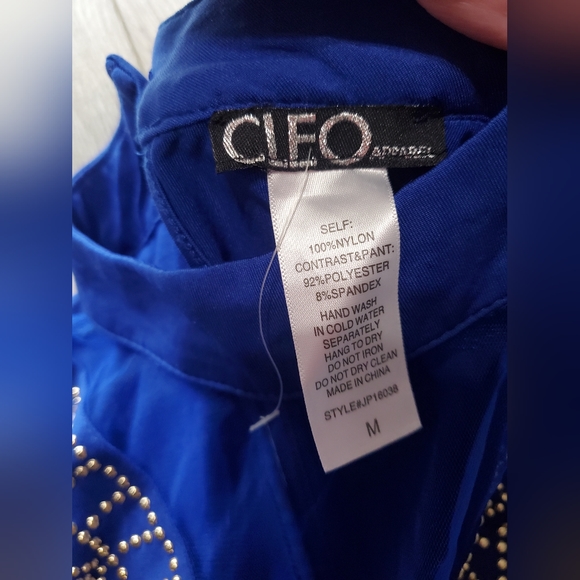Cleo Apparel | Pants & Jumpsuits | Cleo Apparel Blue Jumpsuit With ...